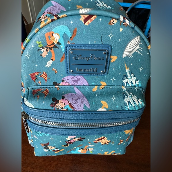 Loungefly | Bags | Disney Parks Loungefly Backpack Attractions And ...